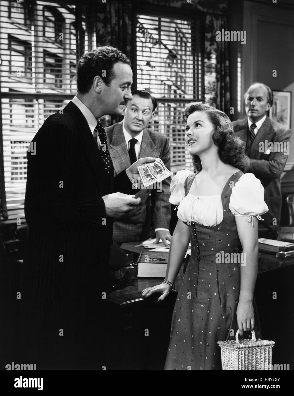 A KISS FOR CORLISS, from left, David Niven, Tom Tully, Shirley Temple ...