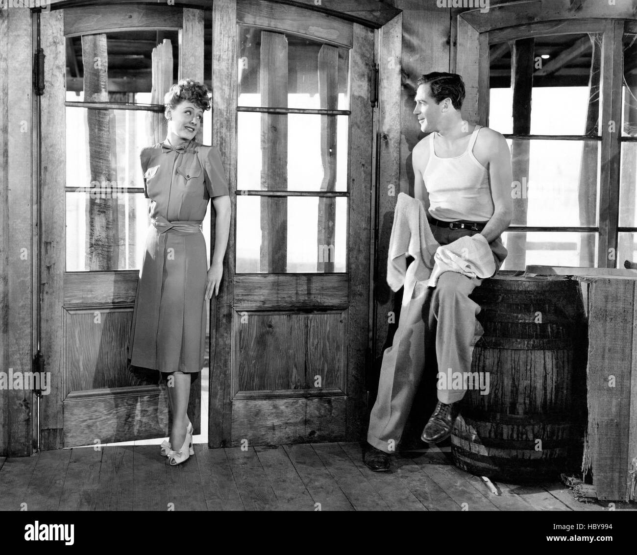 LADY IN A JAM, from left: Irene Dunne, Patric Knowles, 1942 Stock Photo ...