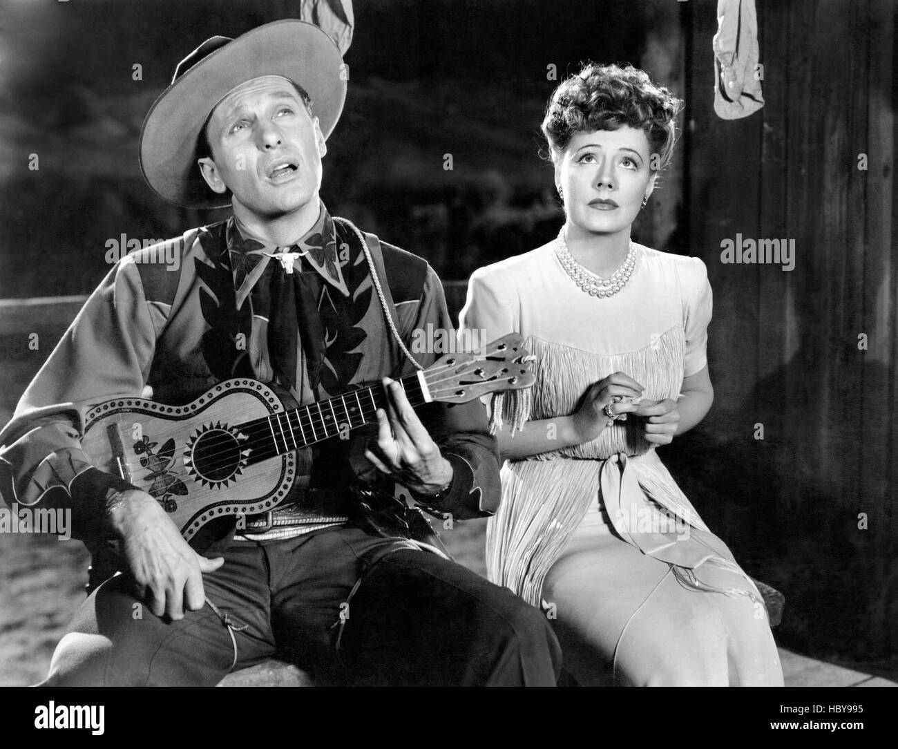 LADY IN A JAM, from left: Ralph Bellamy, Irene Dunne, 1942 Stock Photo ...