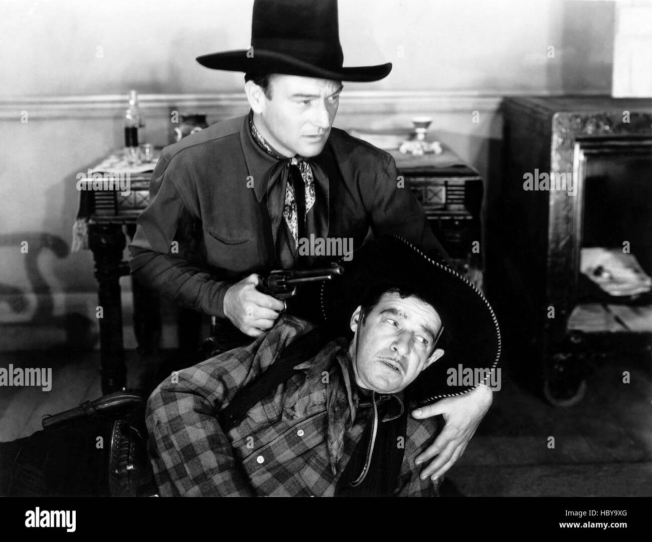 THE LAWLESS NINETIES, from top, John Wayne, Al Bridge, 1936 Stock Photo ...