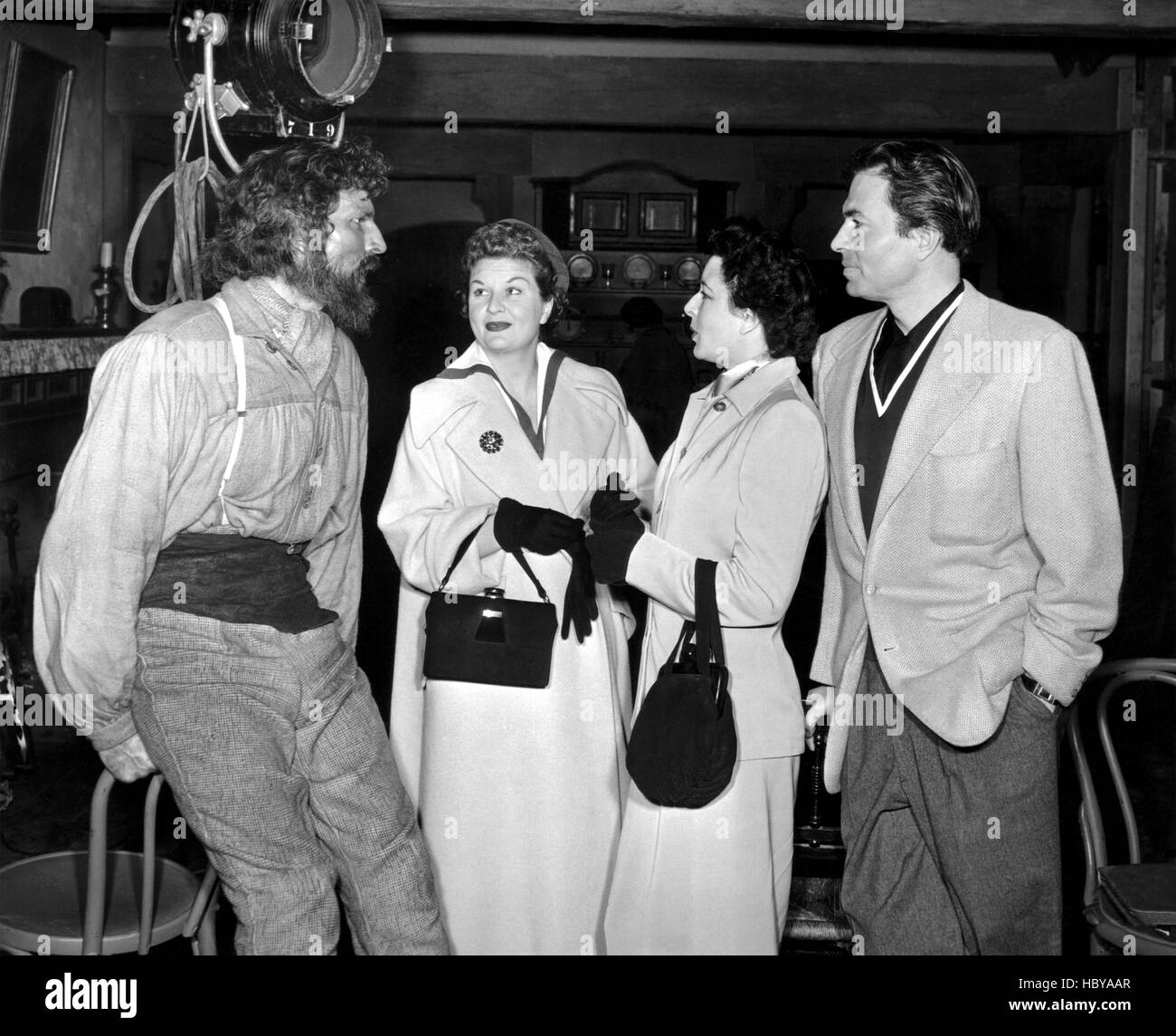 LES MISERABLES, from left: Michael Rennie greeting wife Maggie McGrath ...