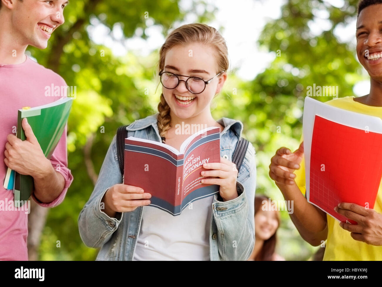 Diverse Young Students Book Outdoors Concept Stock Photo - Alamy