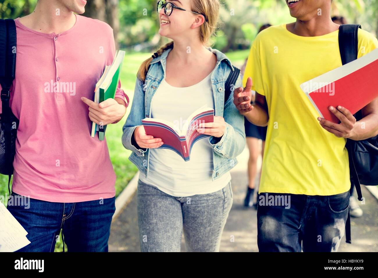Diverse Young Students Book Outdoors Concept Stock Photo - Alamy