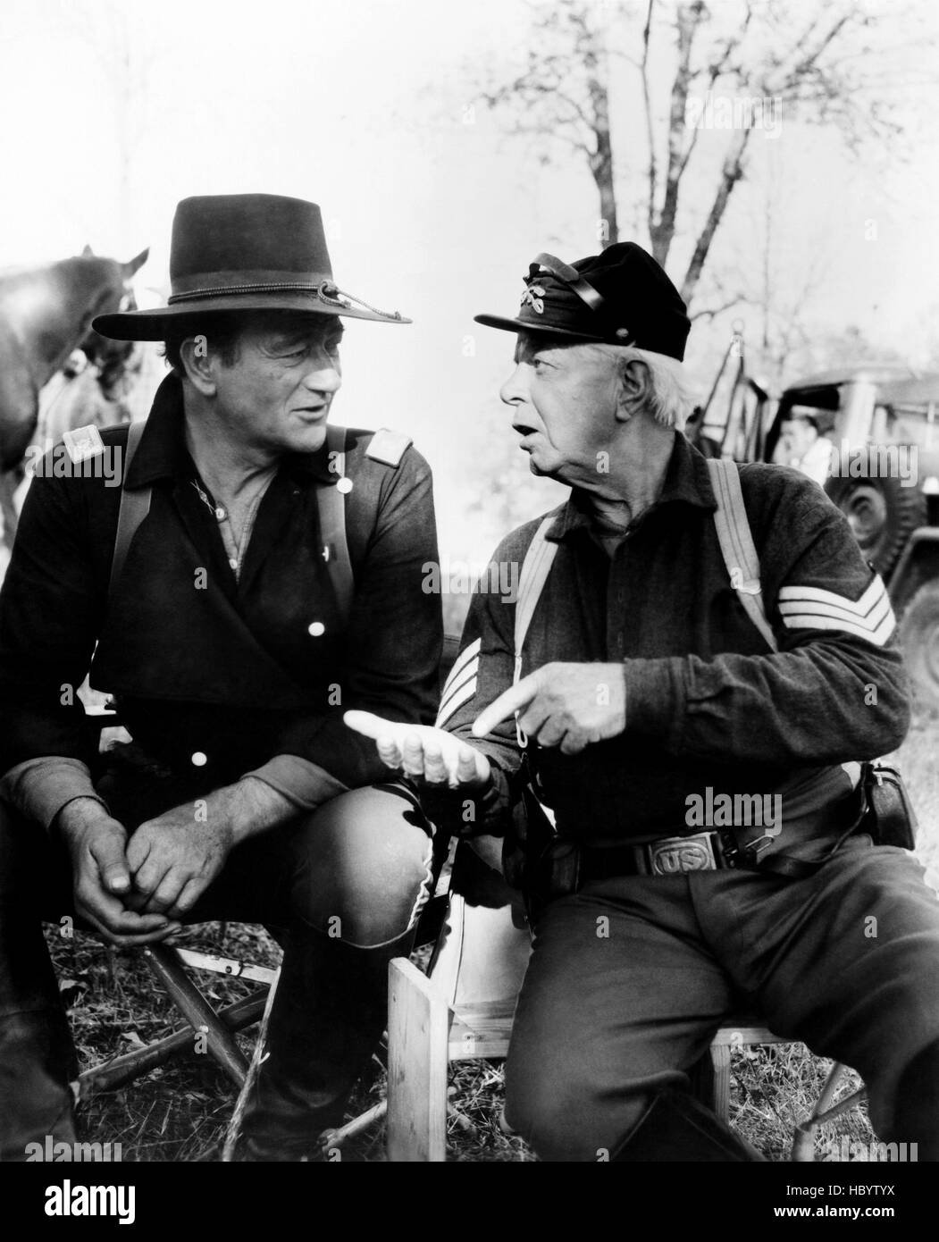 THE HORSE SOLDIERS, from left, John Wayne, Hoot Gibson, on-set, 1959 ...