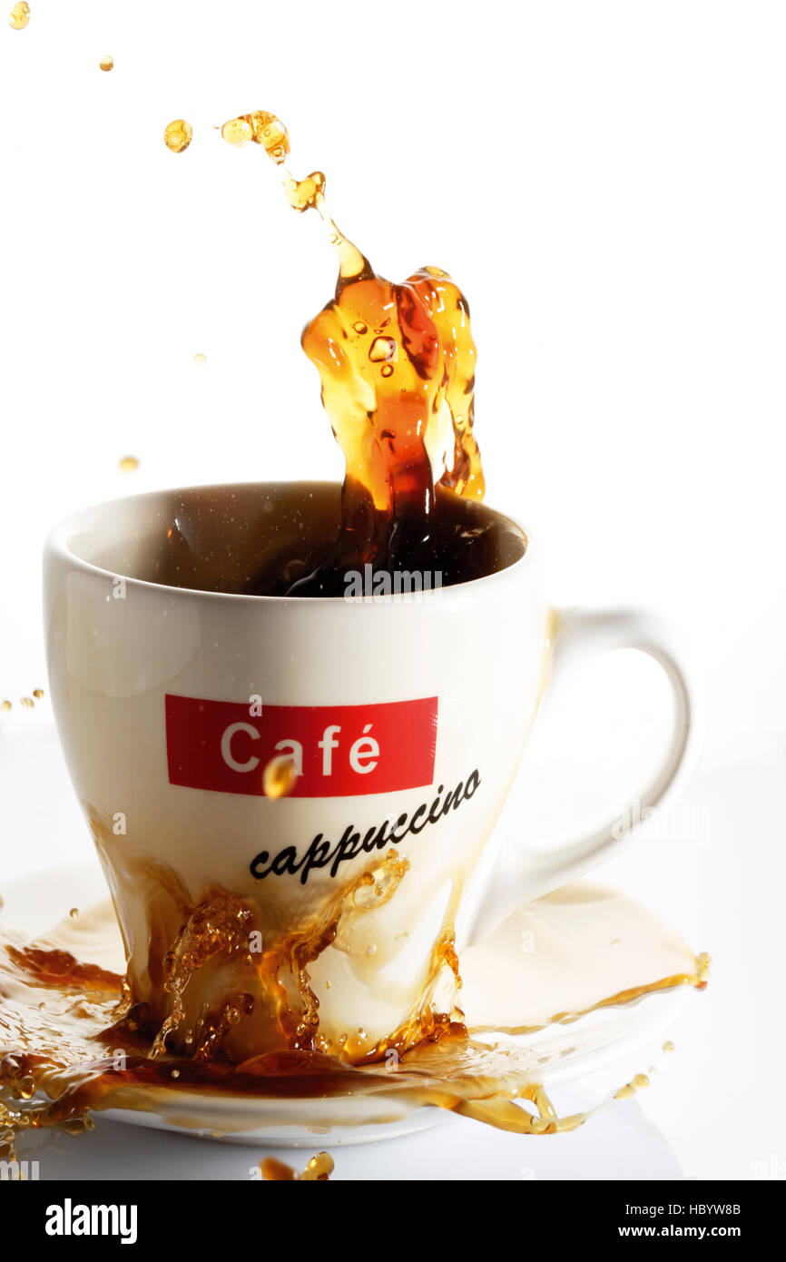 Spilling over cup of coffee Stock Photo - Alamy