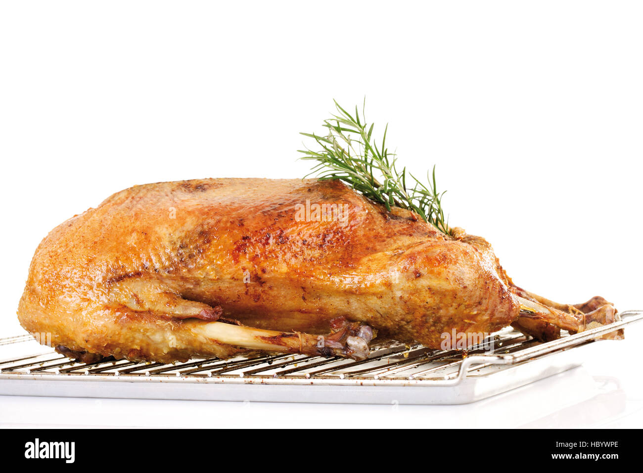 Roast goose on a grill Stock Photo - Alamy