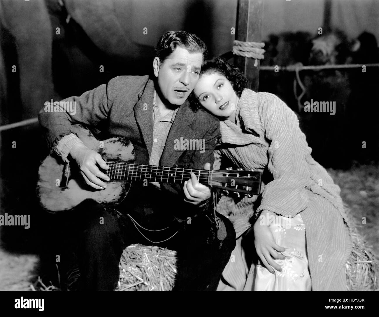 I'LL GIVE A MILLION, from left, Warner Baxter, Marjorie Weaver, 1938 ...