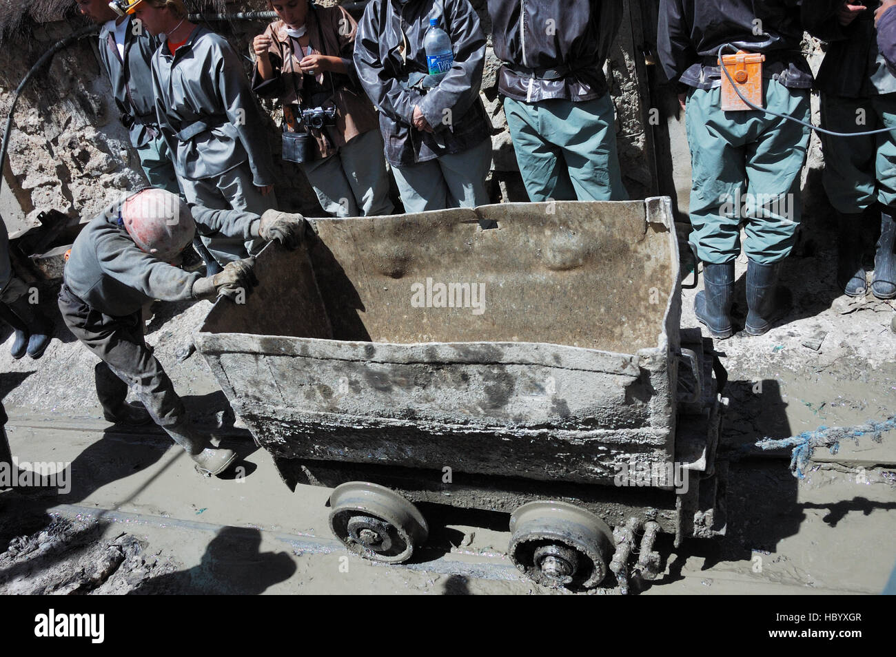 Miners pushing cart hi-res stock photography and images - Alamy