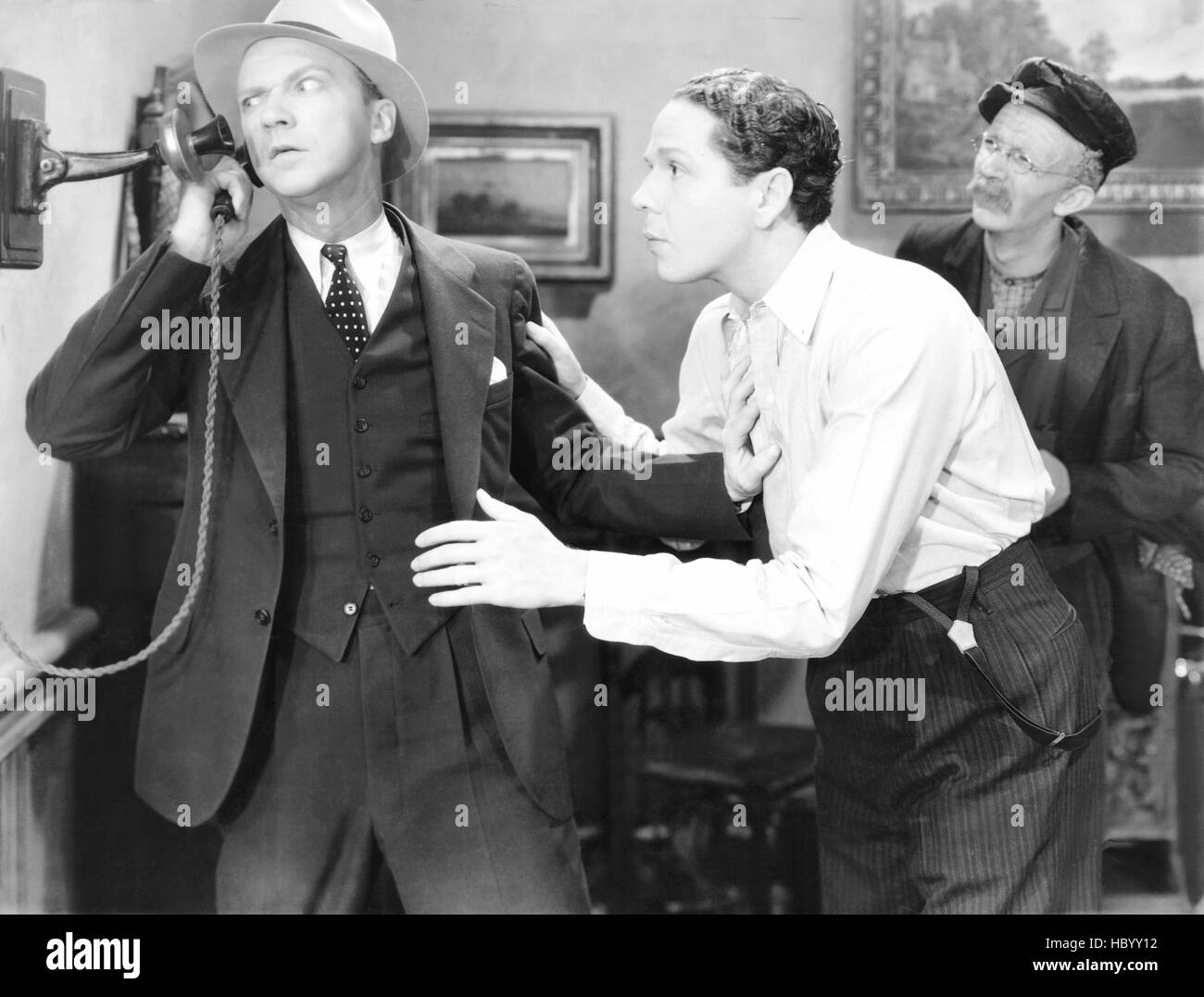 I'LL TELL THE WORLD, from left: Lee Tracy, Roger Pryor, Walter Brennan ...