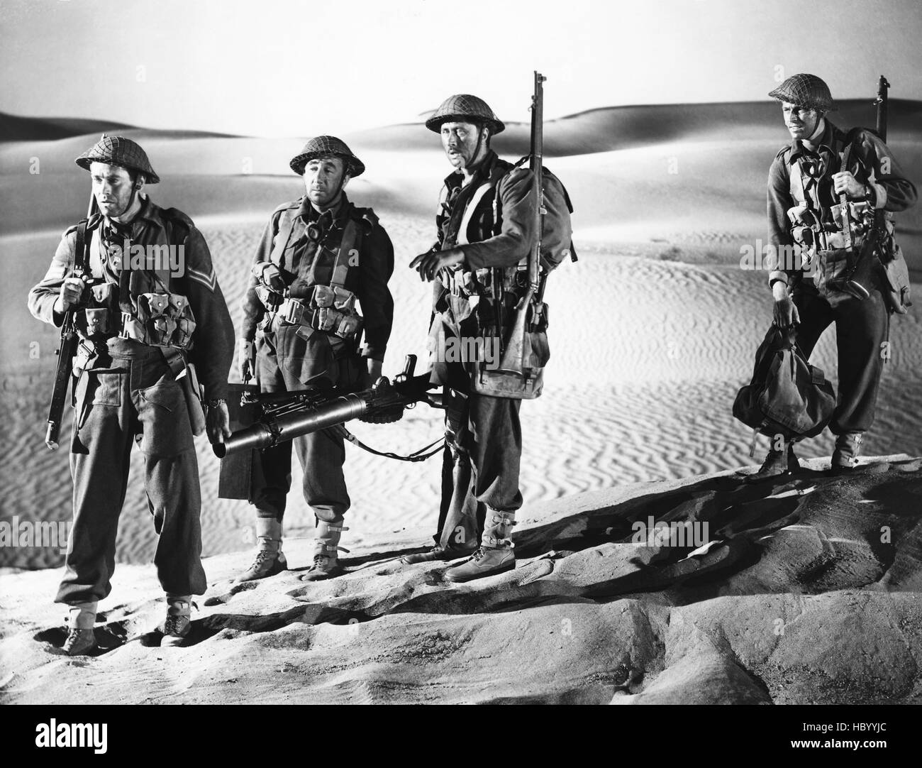 IMMORTAL SERGEANT, from left: Henry Fonda, Melville Cooper, Allyn ...