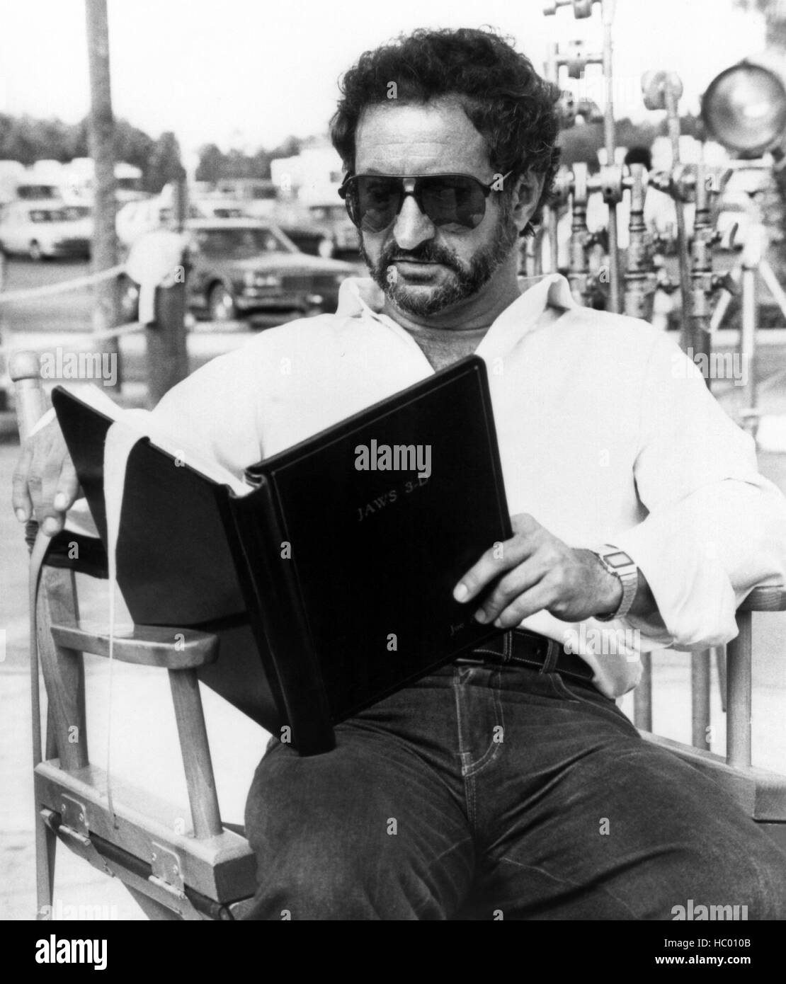 JAWS 3-D, (aka JAWS 3), director Joe Alves studies the script, on set ...