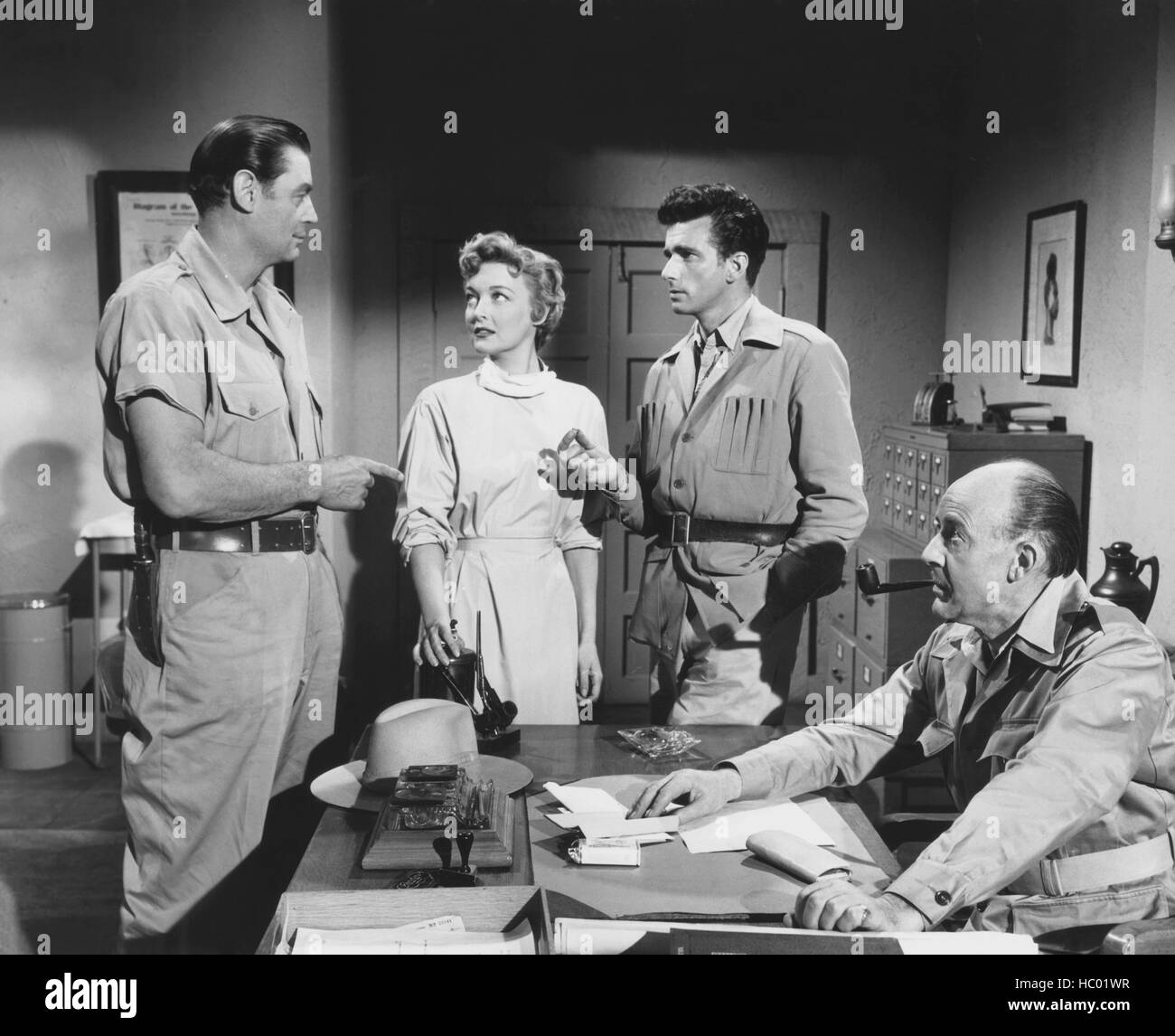 JUNGLE MAN-EATERS, from left, Johnny Weissmuller, (as Jungle Jim ...