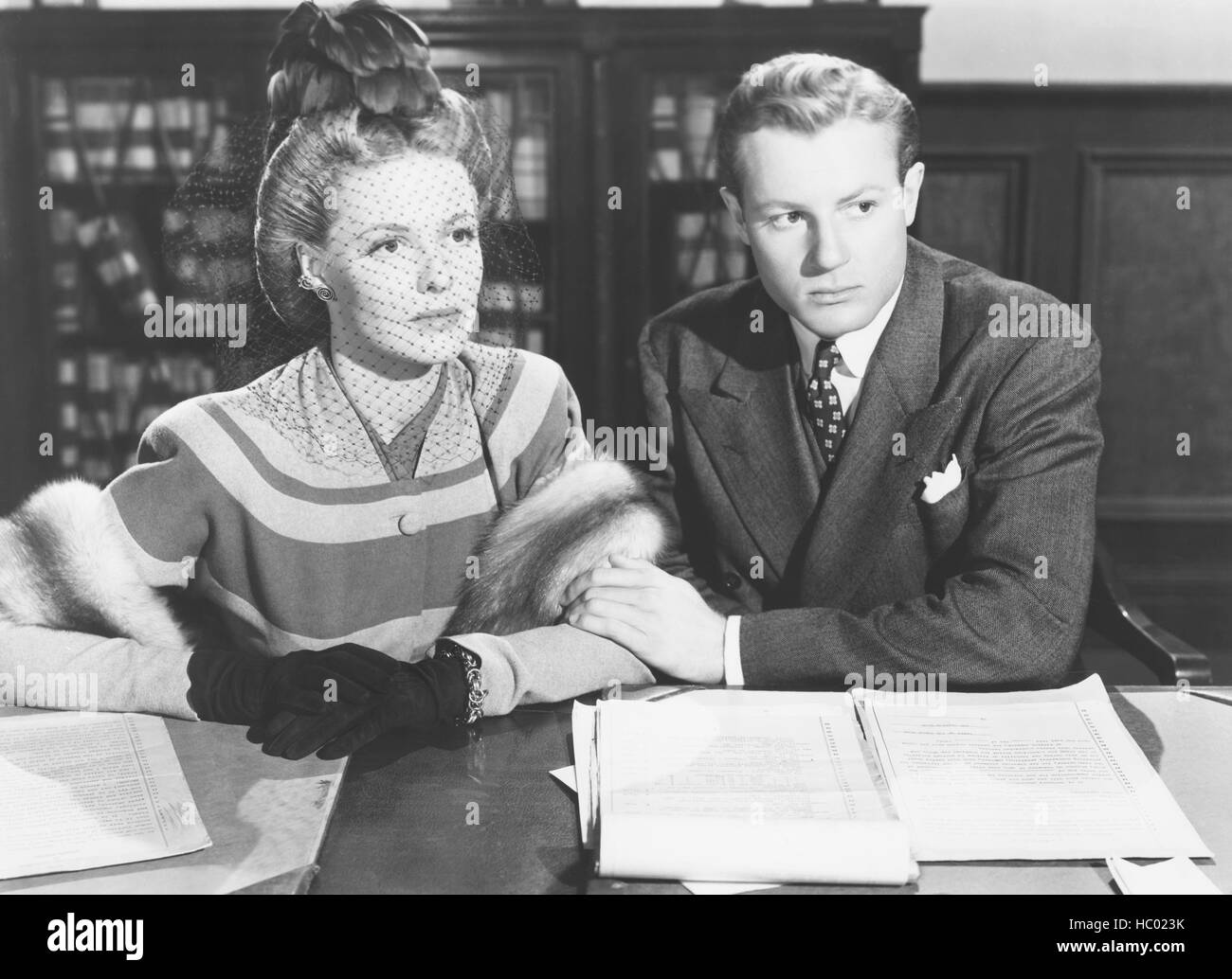 JUST OFF BROADWAY, from left: Janis Carter, Richard Derr, 1942, TM ...