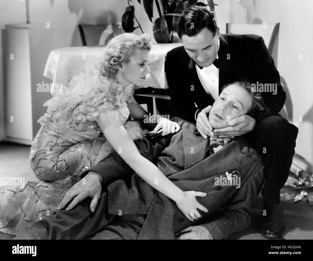 KING OF GAMBLERS, from left: Claire Trevor, Lloyd Nolan (on floor ...