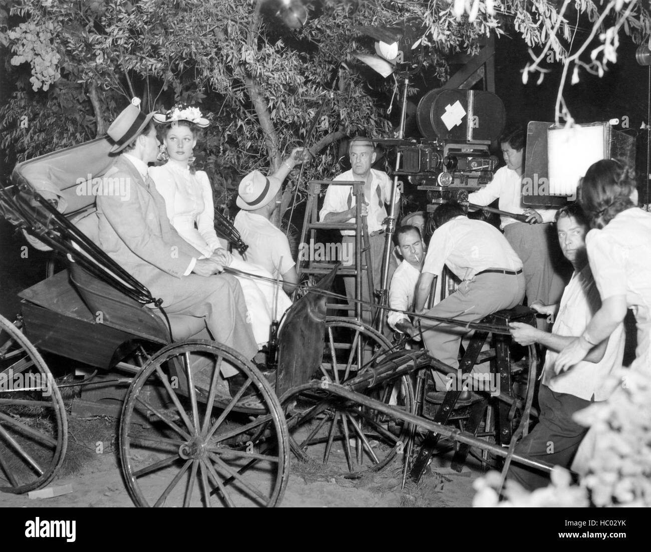 KINGS ROW, in carriage from left: Ronald Reagan, Ann sheridan preparing ...