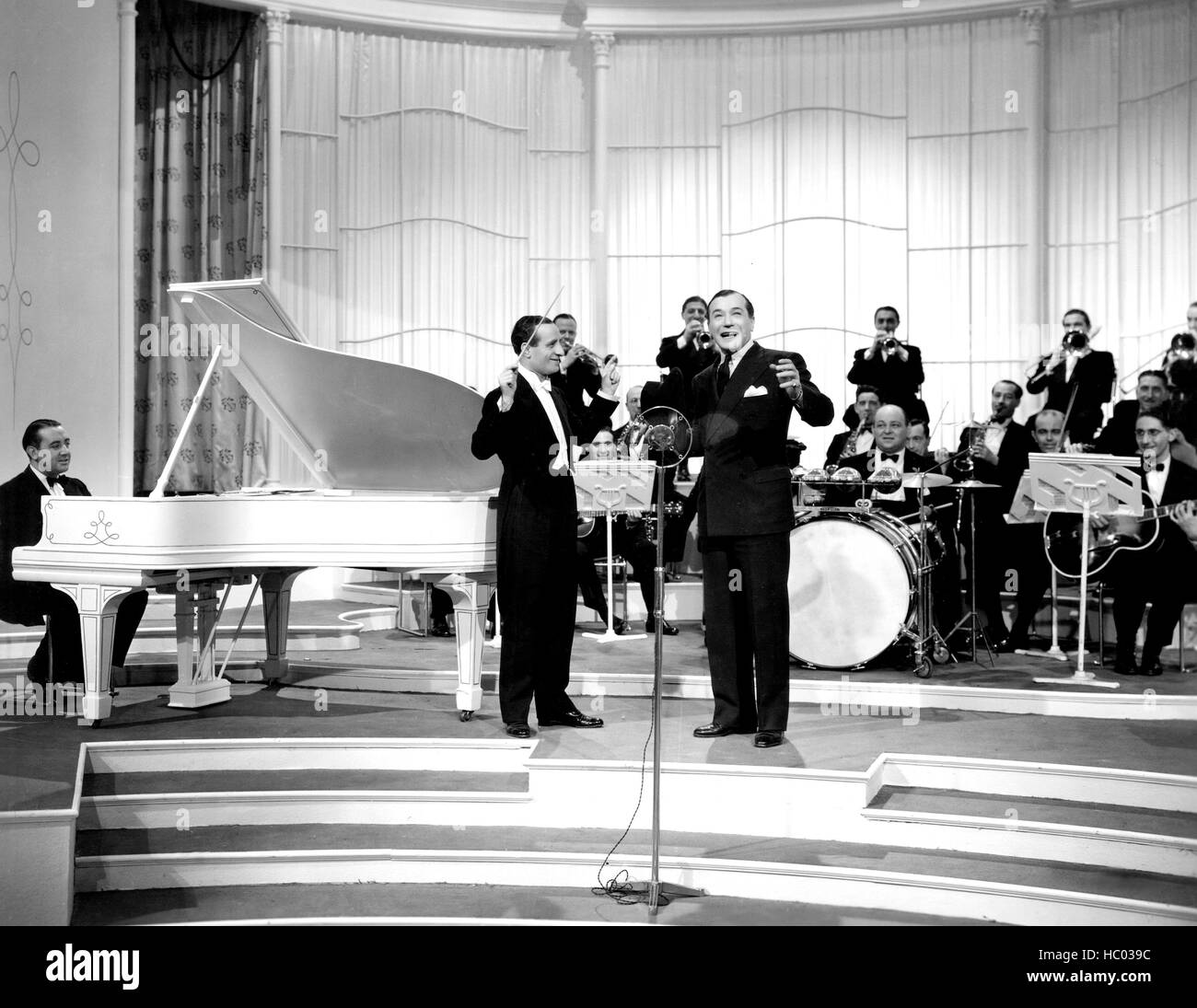 KICKING THE MOON AROUND, (aka THE PLAYBOY), from left, Bert Ambrose, Harry Richman, 1938 Stock ...