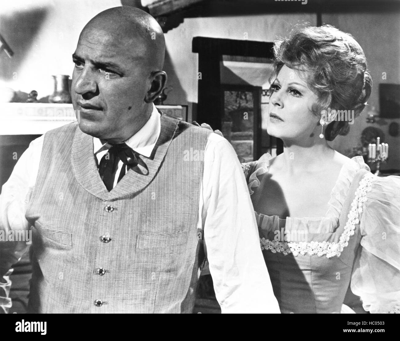 LAND RAIDERS, from left: Telly Savalas, Arlene Dahl, 1969 Stock Photo ...