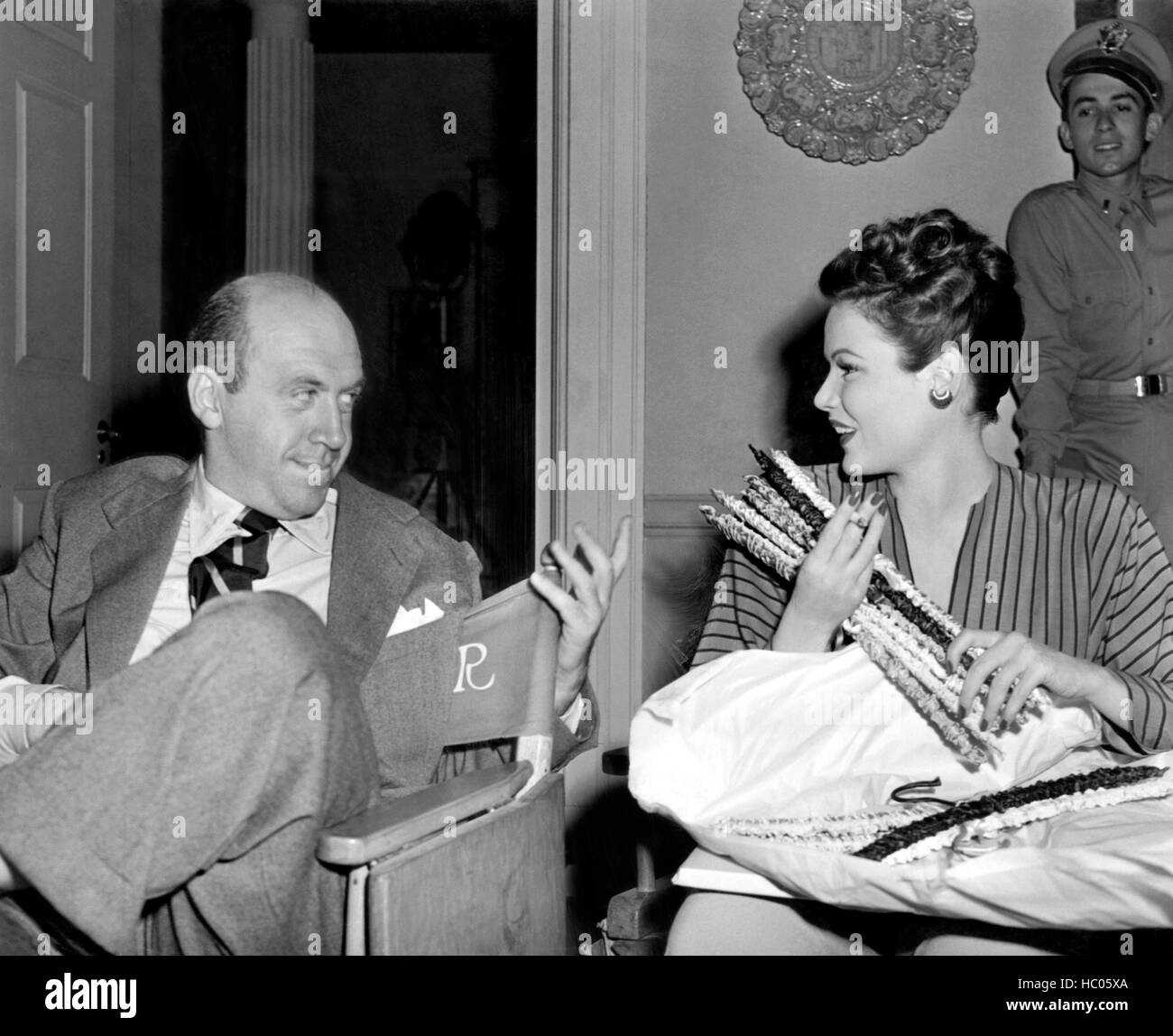LAURA, director Otto Preminger, Gene Tierney on set, 1944, TM ...