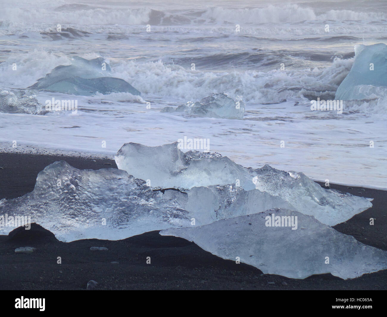 Wave hitting iceberg hi-res stock photography and images - Alamy