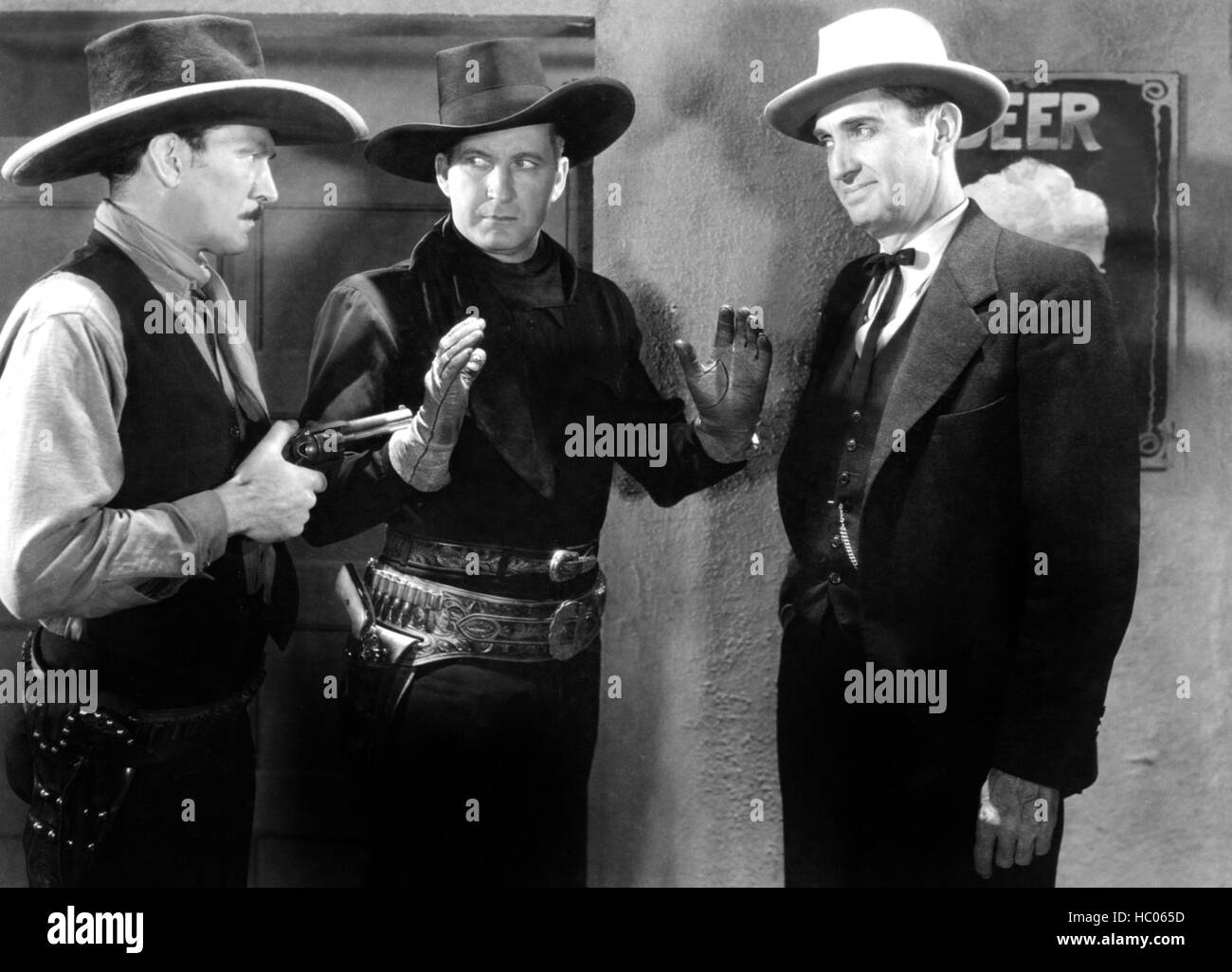 THE LION'S DEN, from left: Karl Hackett, Tim McCoy, J Frank Glendon ...