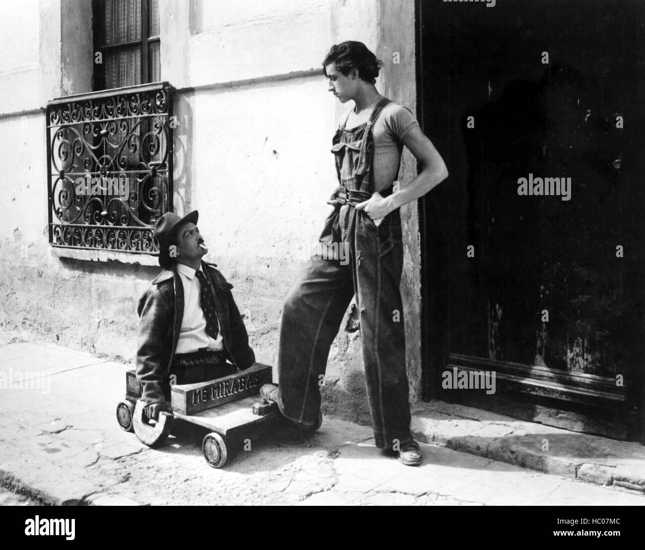 LOS OLVIDADOS, Roberto Cobo (R), 1950 Stock Photo - Alamy