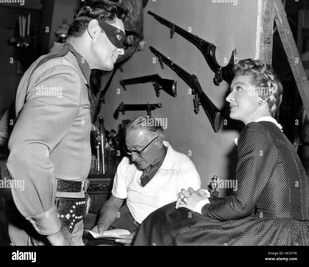 THE LONE RANGER, Clayton Moore, director Stuart Heisler (back), Bonita ...