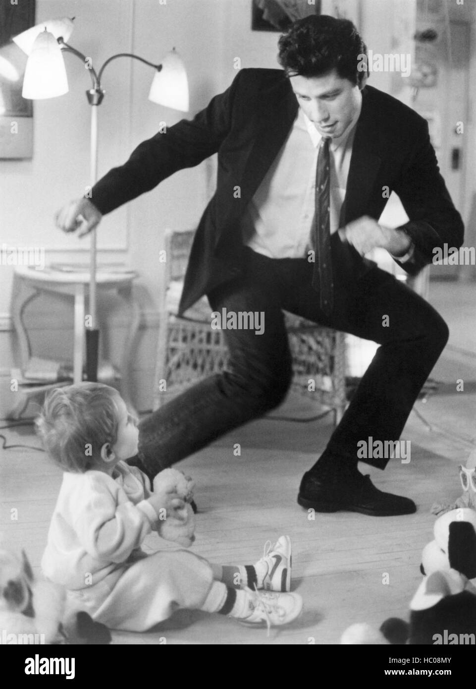 LOOK WHO'S TALKING, from left: Jason Schaller, John Travolta, 1989 ...