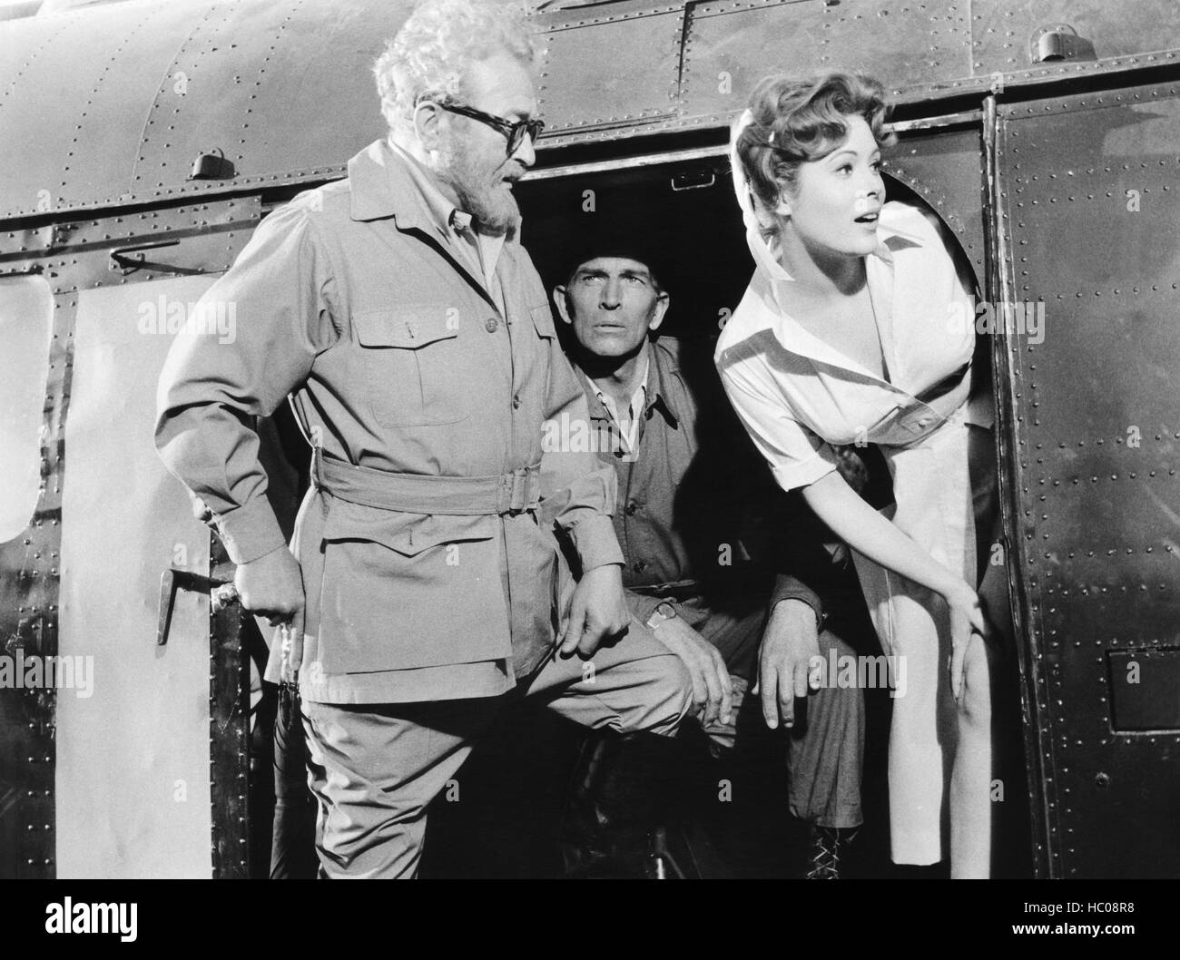 THE LOST WORLD, from left: Claude Rains, Michael Rennie, Jill St. John ...
