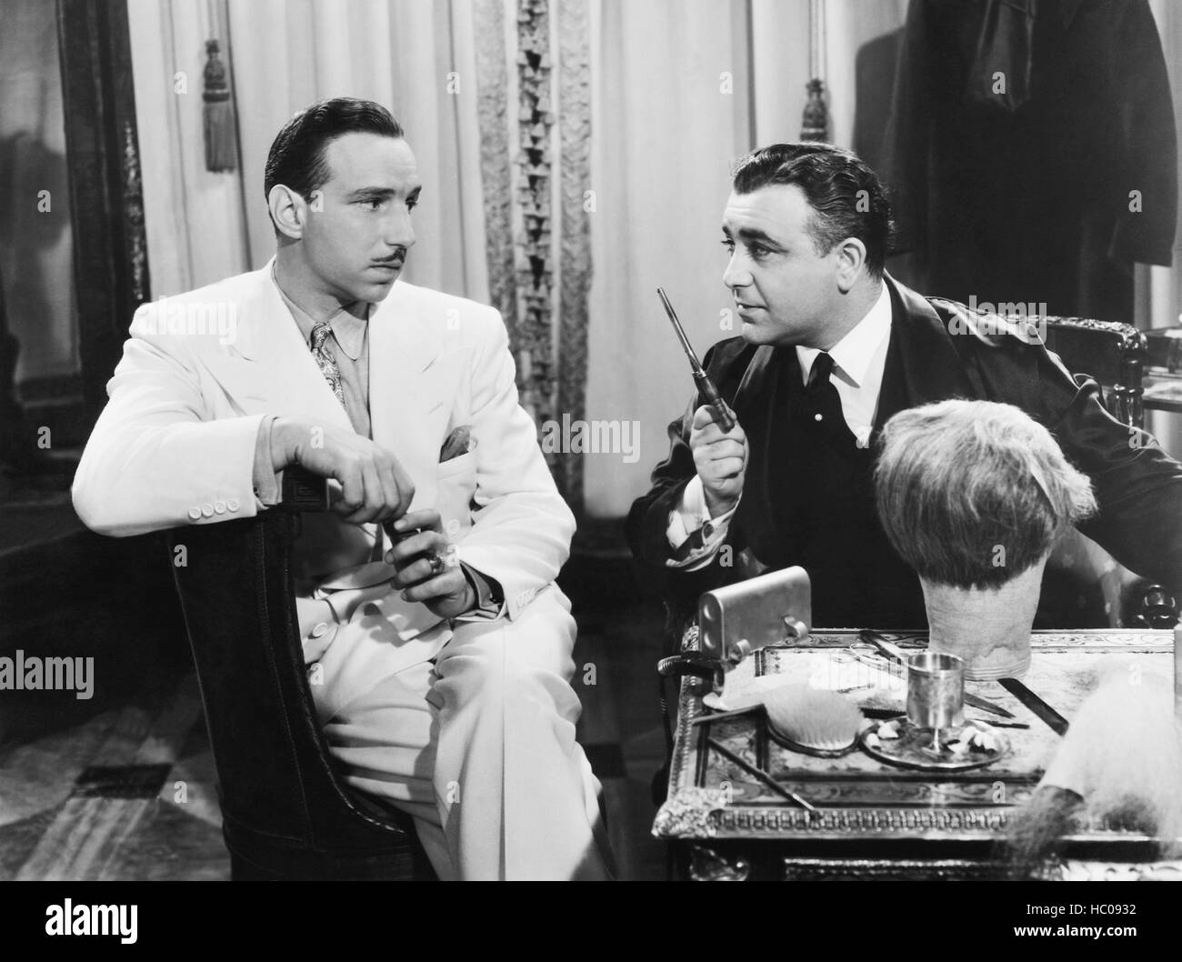 THE MAGNIFICENT FRAUD, from left: Lloyd Nolan, Akim Tamiroff, 1939 ...