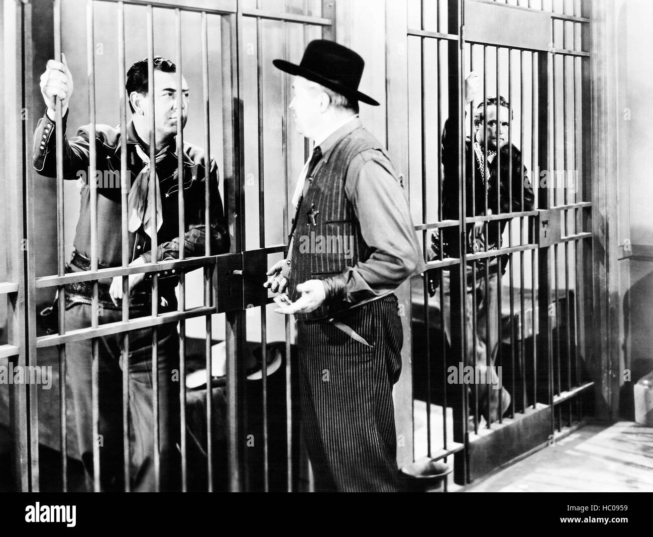 MAN FROM SONORA, face to face form left: Johnny Mack Brown, Lyle Talbot ...