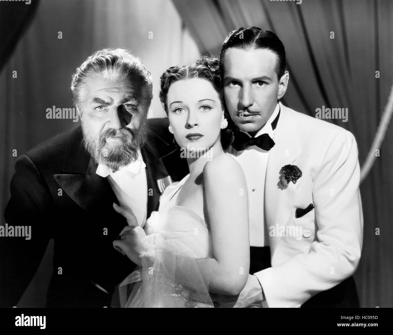 THE MAGNIFICENT FRAUD, from left: Akim Tamiroff, Patricia Morison ...