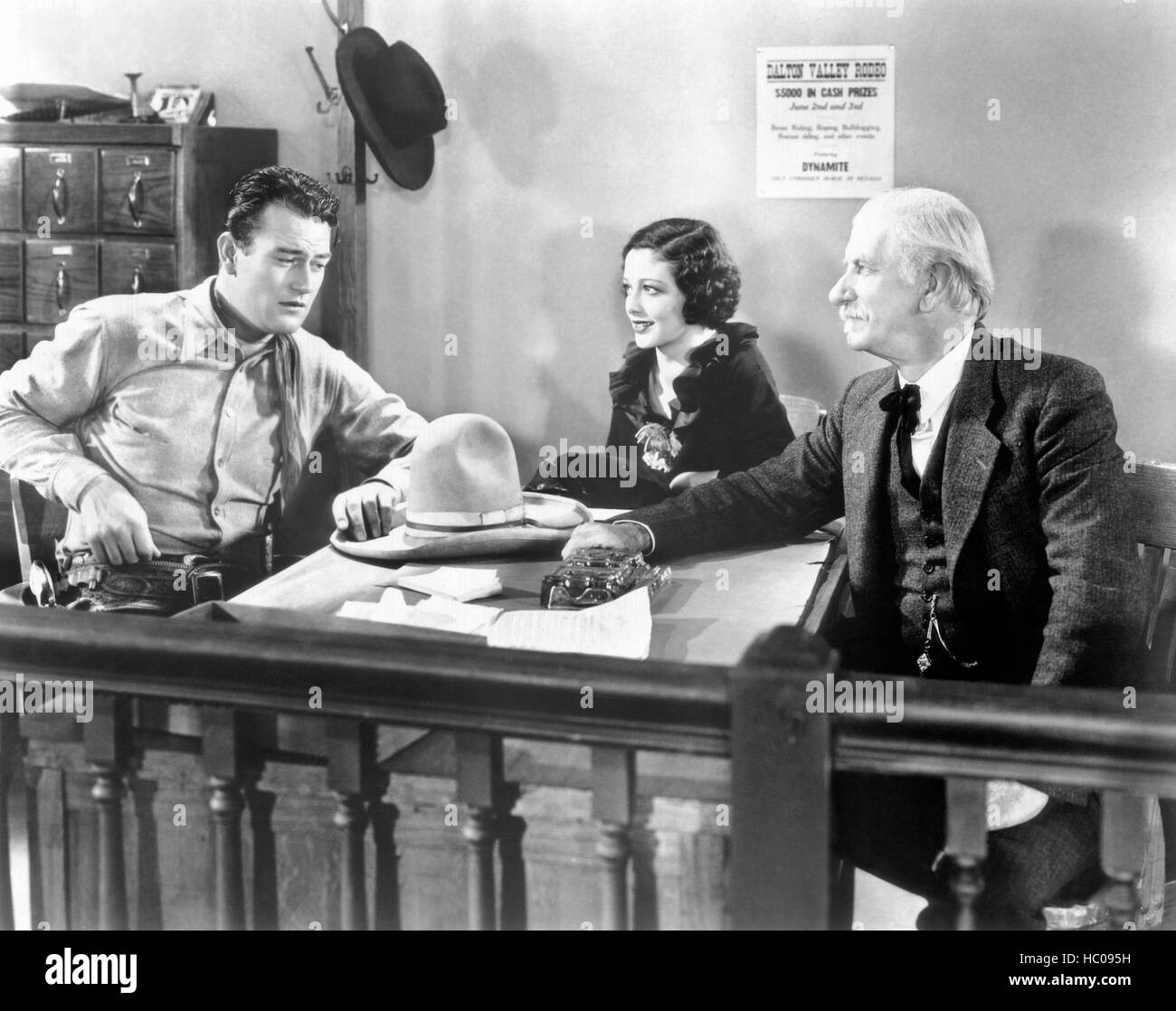 THE MAN FROM UTAH, from left, John Wayne, Polly Ann Young, Edward Peil, Sr., 1934 Stock Photo ...