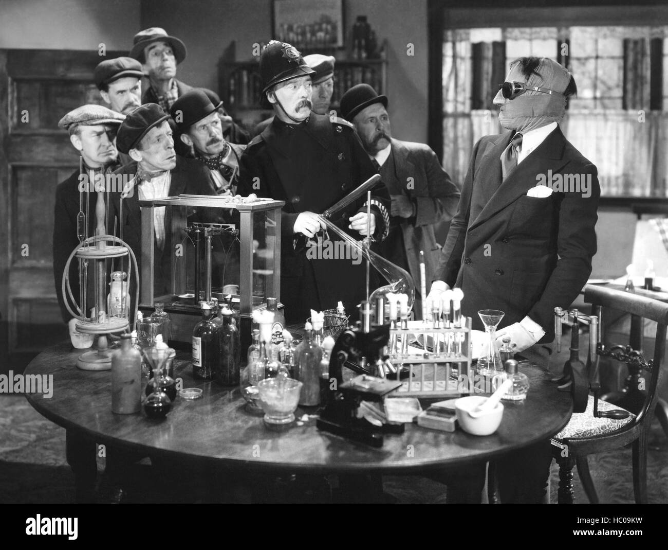 THE INVISIBLE MAN, E.E. Clive (center), Claude Rains, 1933 Stock Photo ...