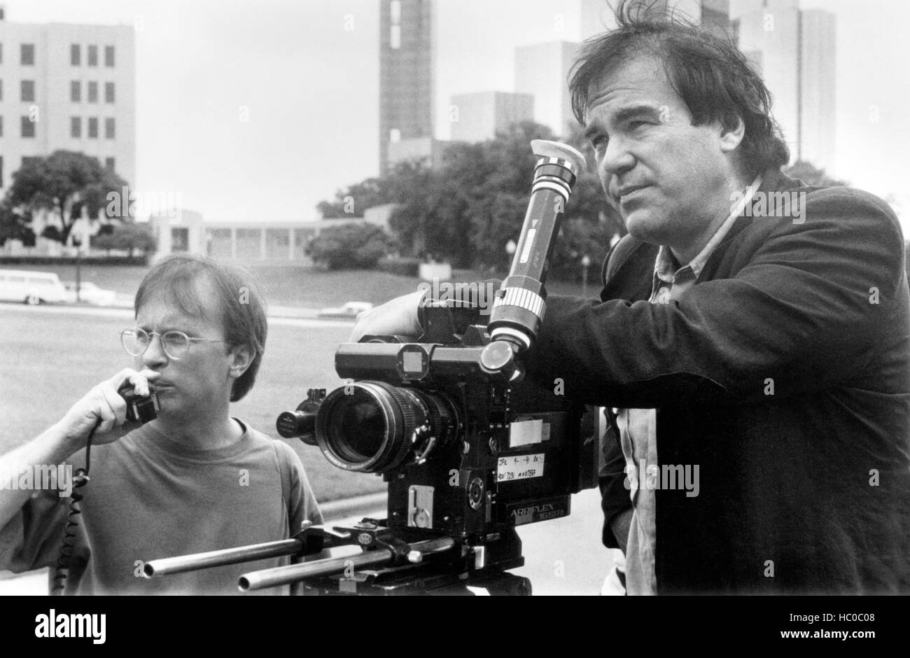 JFK, director Oliver Stone (right), on location, 1991. ©Warner Brothers ...