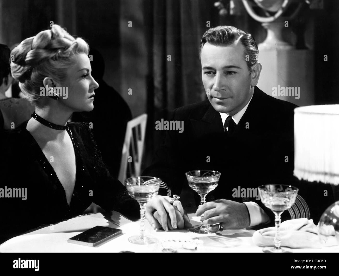 JOHNNY ANGEL, from left: Claire Trevor, George Raft, 1945 Stock Photo ...