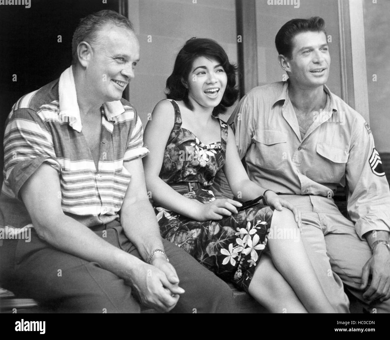 JOE BUTTERFLY, director Jesse Hibbs, Reiko Higa, George Nader, relax in ...