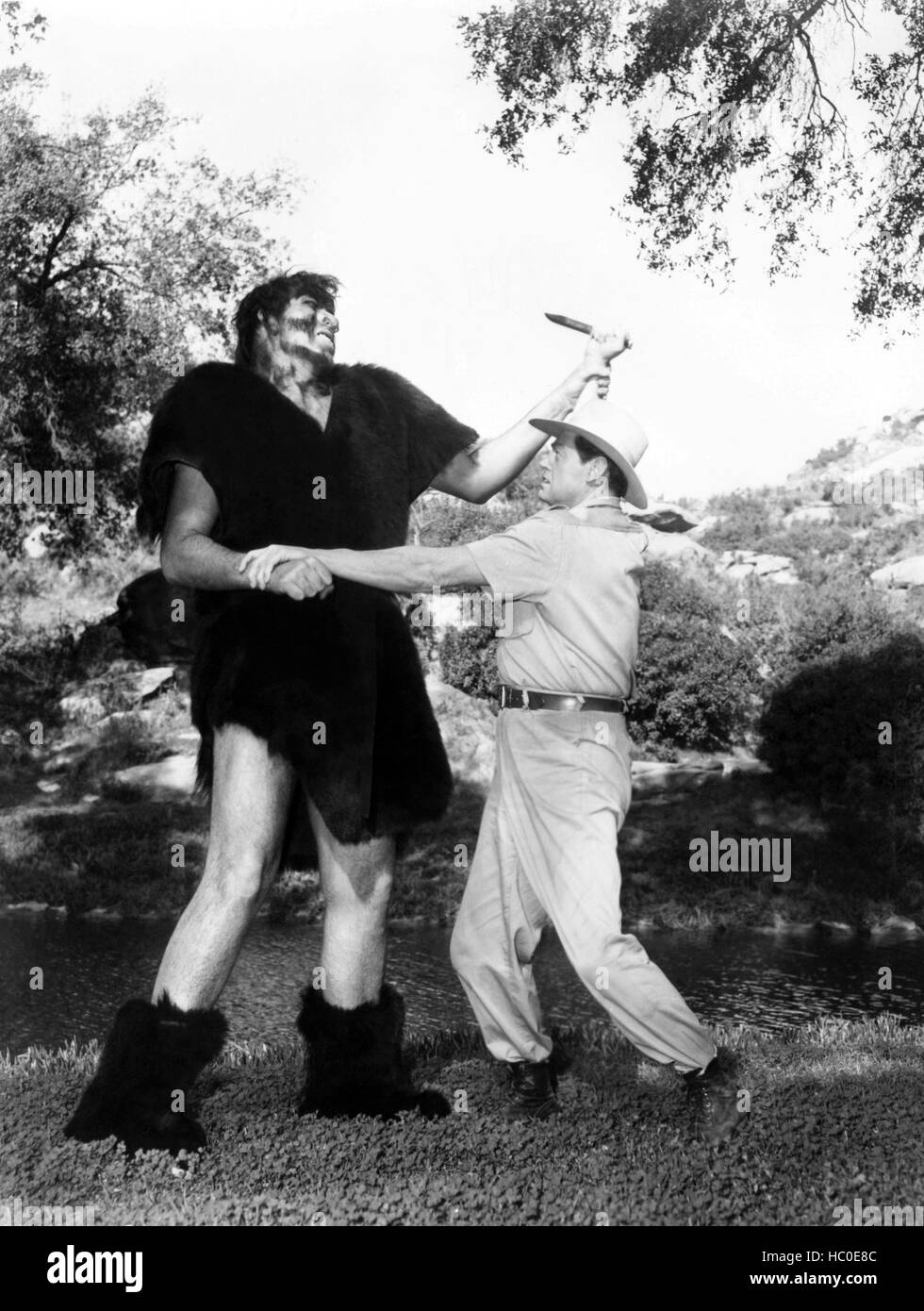 KILLER APE, from left: Max Palmer, Johnny Weissmuller, 1953 Stock Photo ...