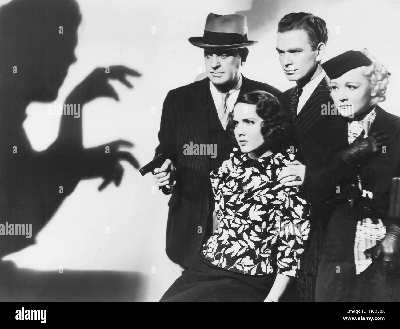 KILLER AT LARGE, from left: Thurston Hall, Mary Brian, Russell Hardie ...