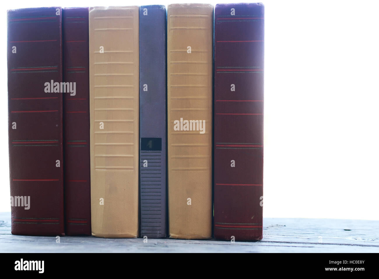 books standing on a table Stock Photo - Alamy