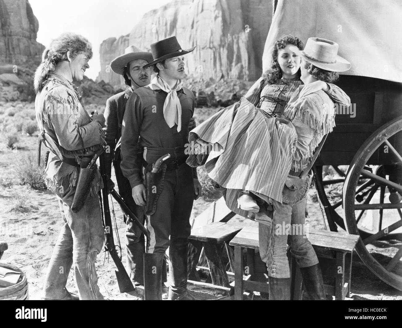 KIT CARSON, from left: Ward Bond, Harold Huber (rear), Dana Andrews ...