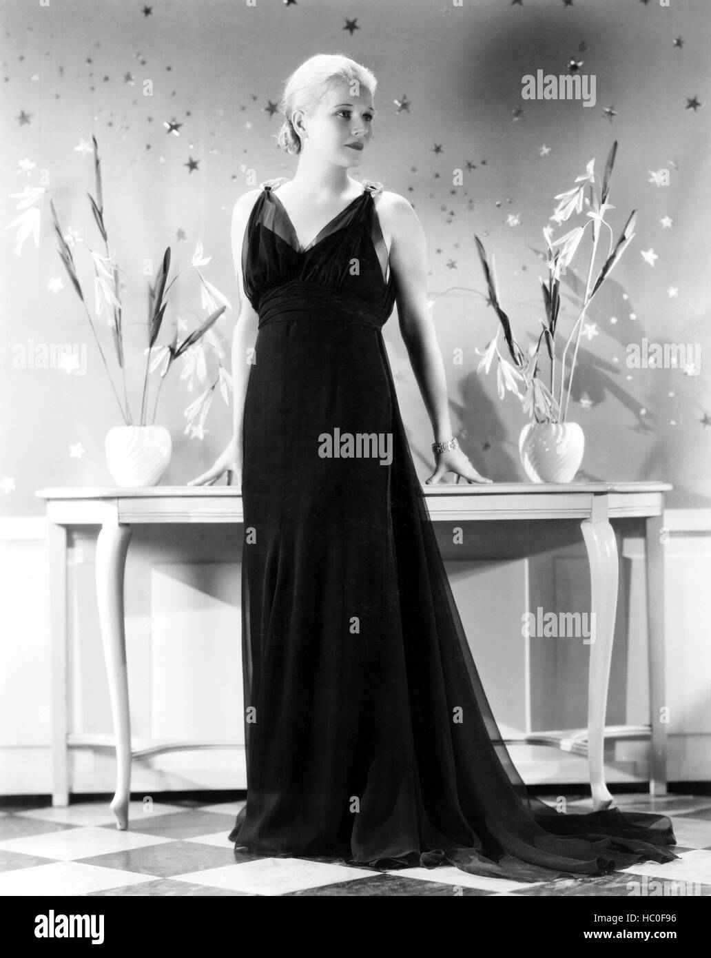 THE LADY CONSENTS, Ann Harding, in a black chiffon gown with diamante ...
