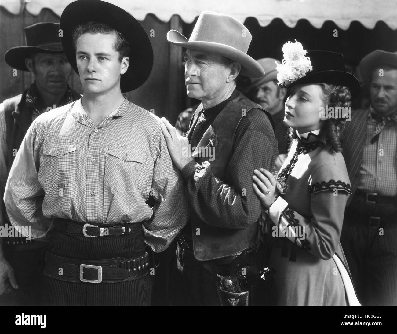 THE LAW WEST OF TOMBSTONE, foreground from left: Tim Holt, Harry Carey ...