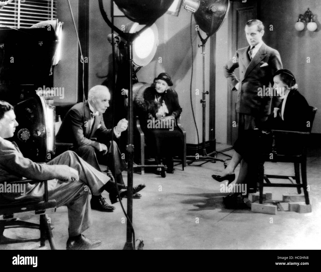 LETTY LYNTON, Clarence Brown, left, directs, from left, Lewis Stone ...