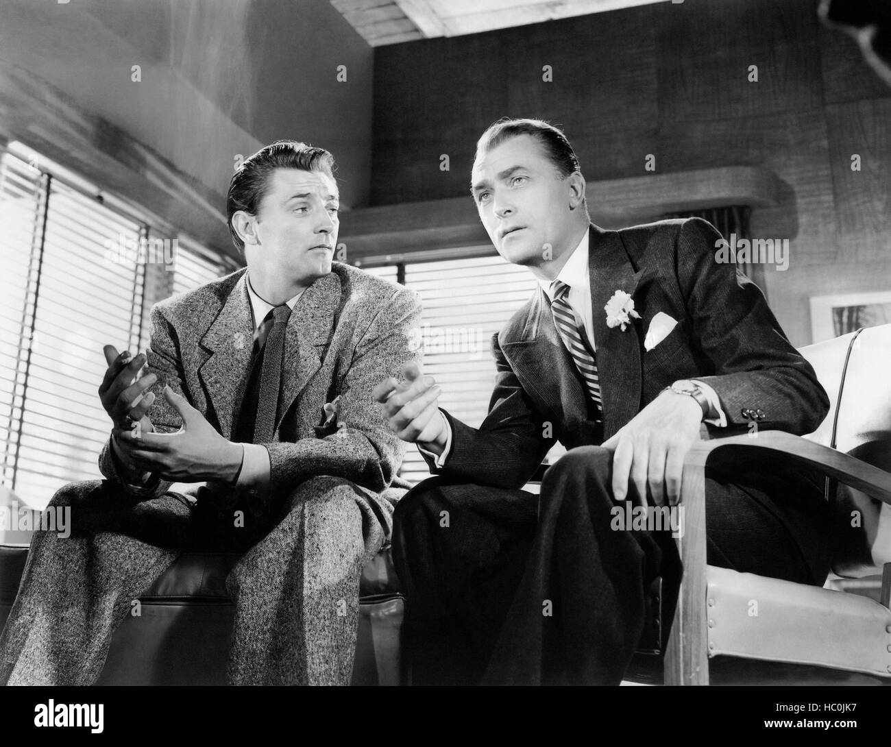 THE LOCKET, from left, Robert Mitchum, Brian Aherne, 1946 Stock Photo ...