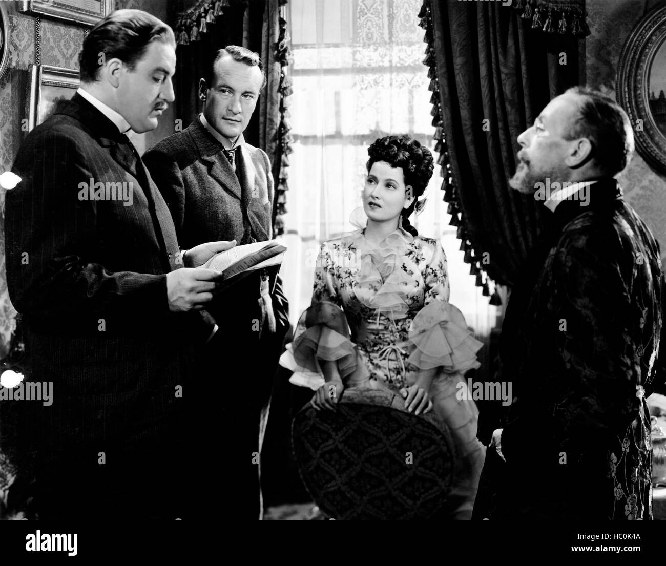 THE LODGER, from left: Laird Cregar, George Sanders, Merle Oberon ...