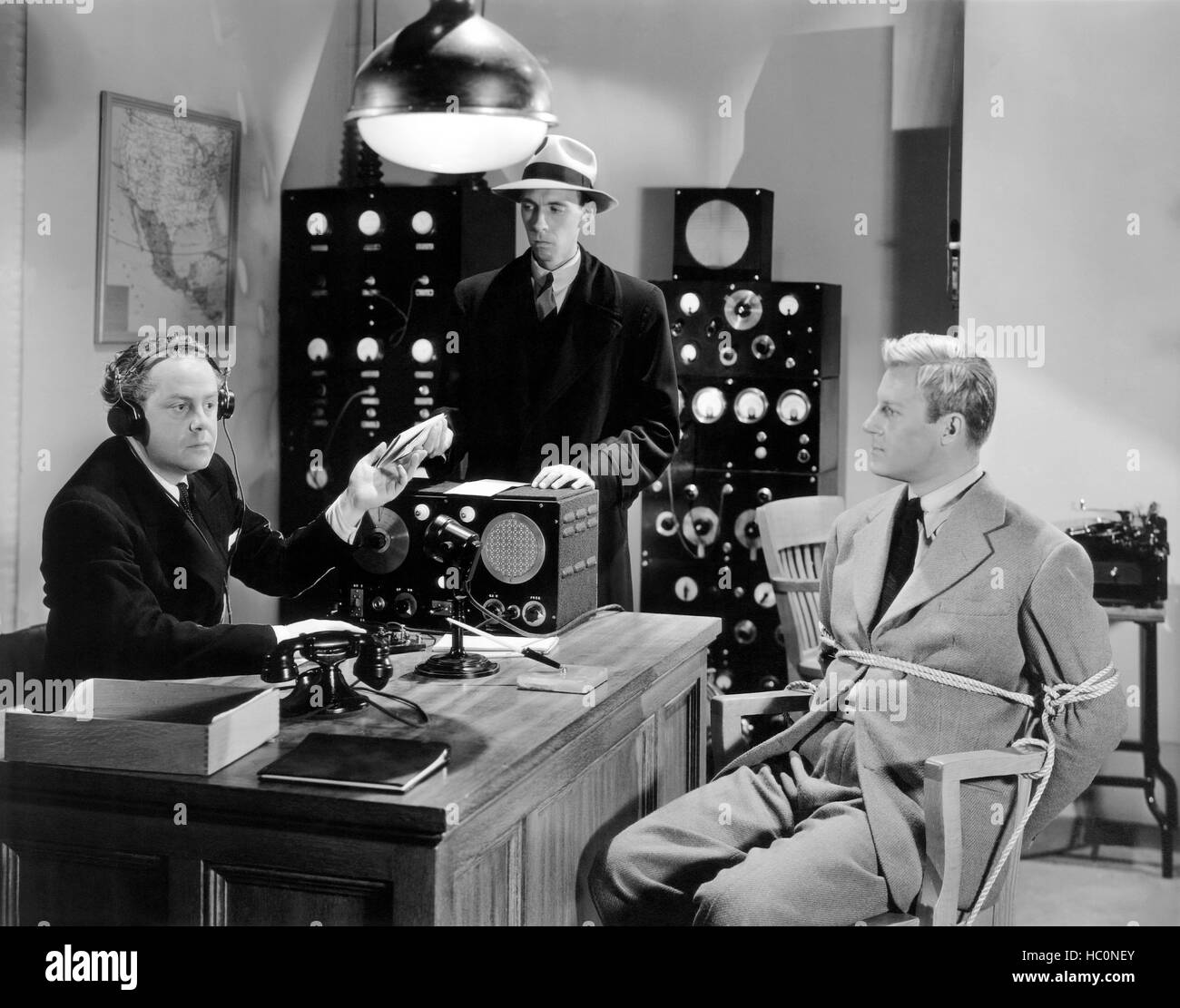 MAN AT LARGE, from left: Steven Geray, Milton Parsons, Richard Derr ...