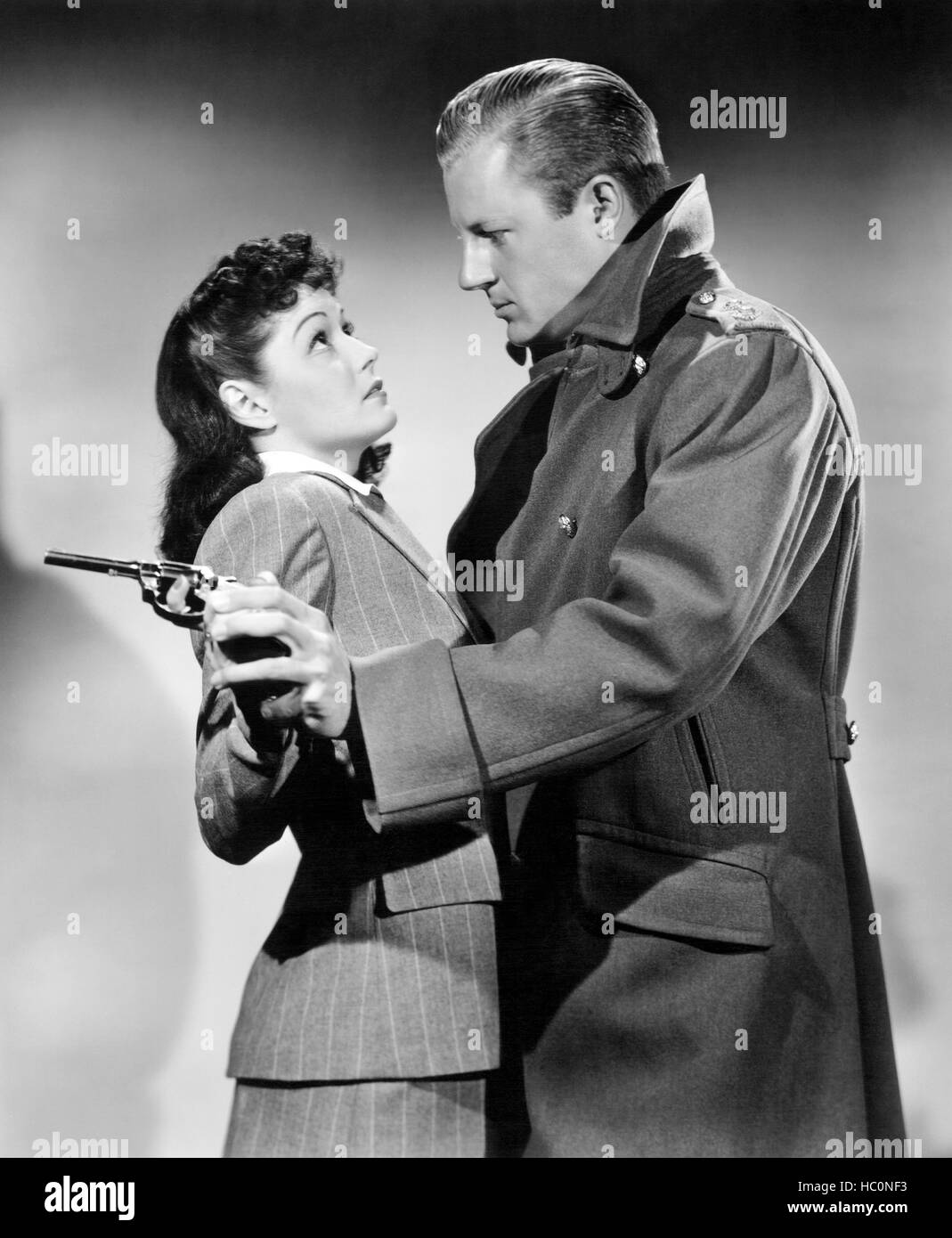MAN AT LARGE, from left: Marjorie Weaver, Richard Derr, 1941. ©20th ...