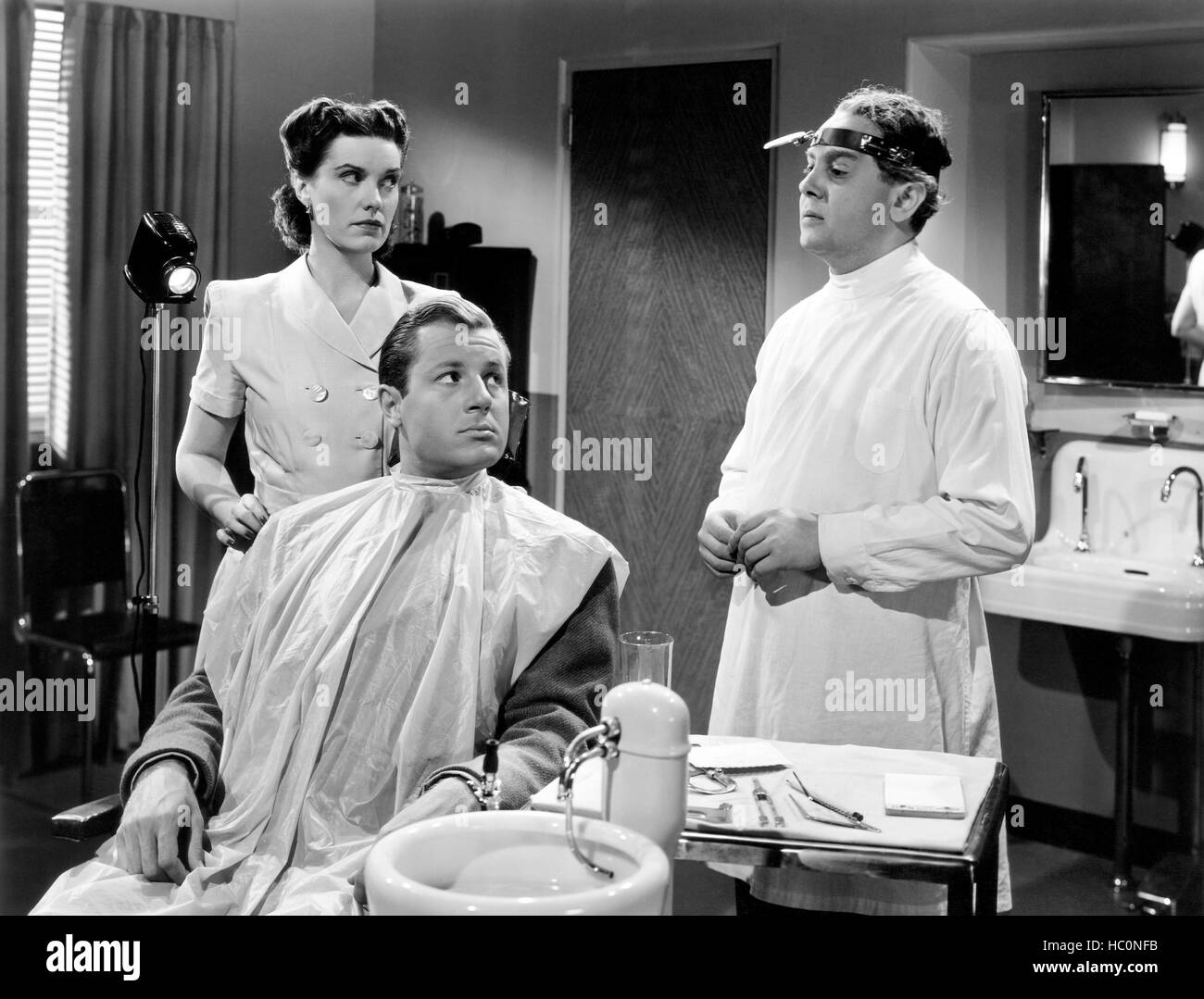 MAN AT LARGE, from left: Lenita Lane, Richard Derr, Steven Geray, 1941 ...