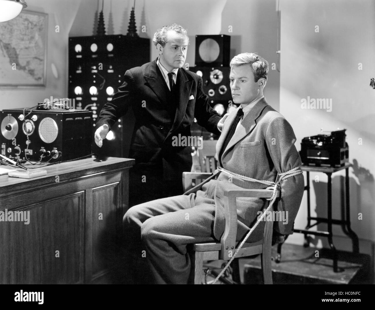 MAN AT LARGE, from left: Steven Geray, Richard Derr, 1941. ©20th ...