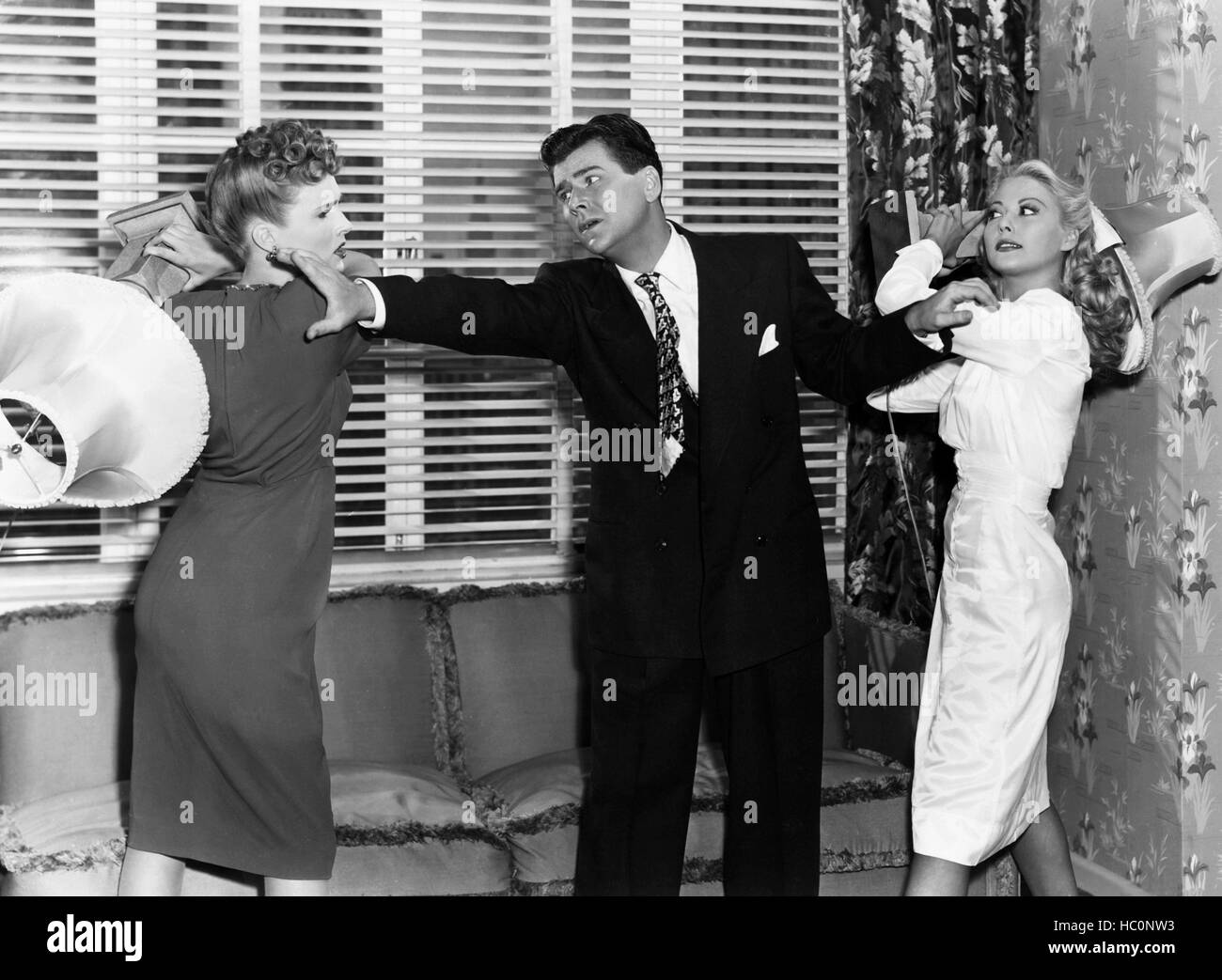 THE MAGNIFICENT ROGUE, from left, Lynne Roberts, Warren Douglas, Adele ...